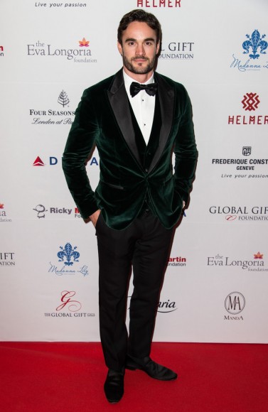 Thom Evans is Festive in Green Dolce & Gabbana Velvet Jacket for Global ...